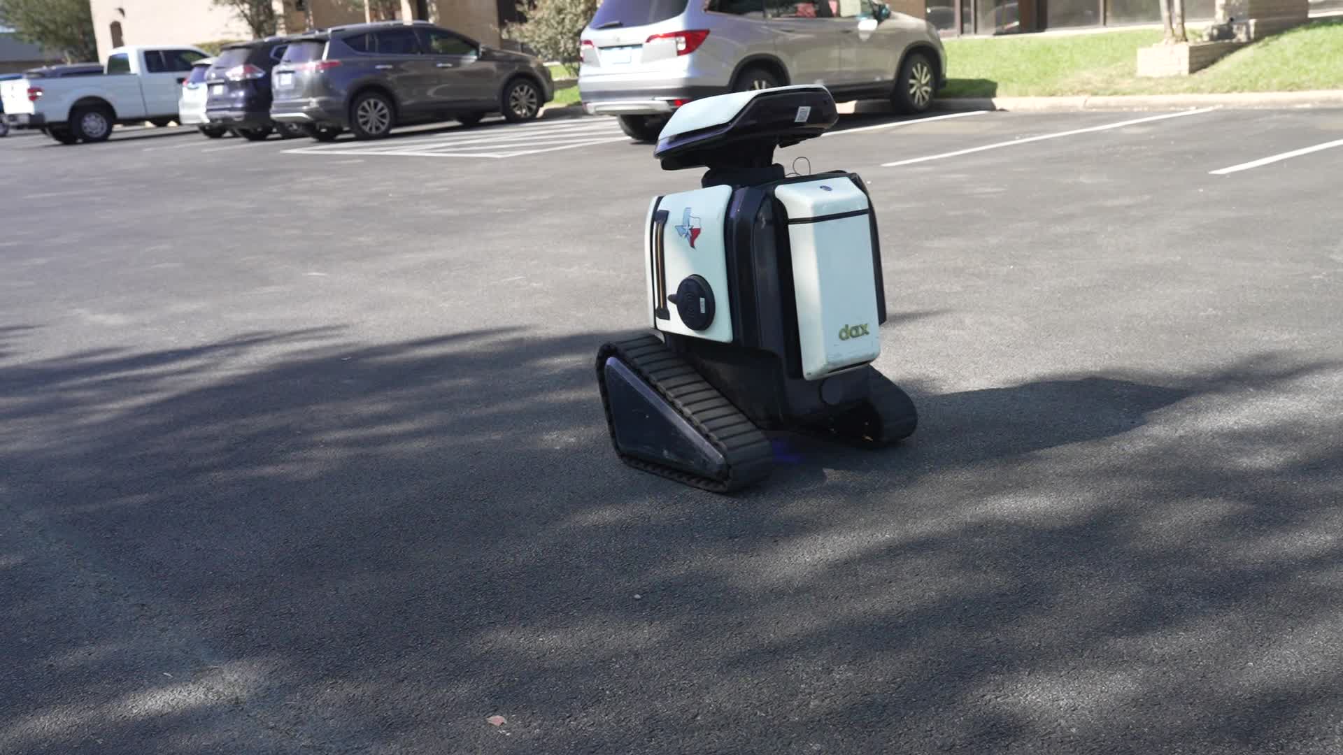 Three-foot-tall surveillance robot patrolling parking lot in Austin ...