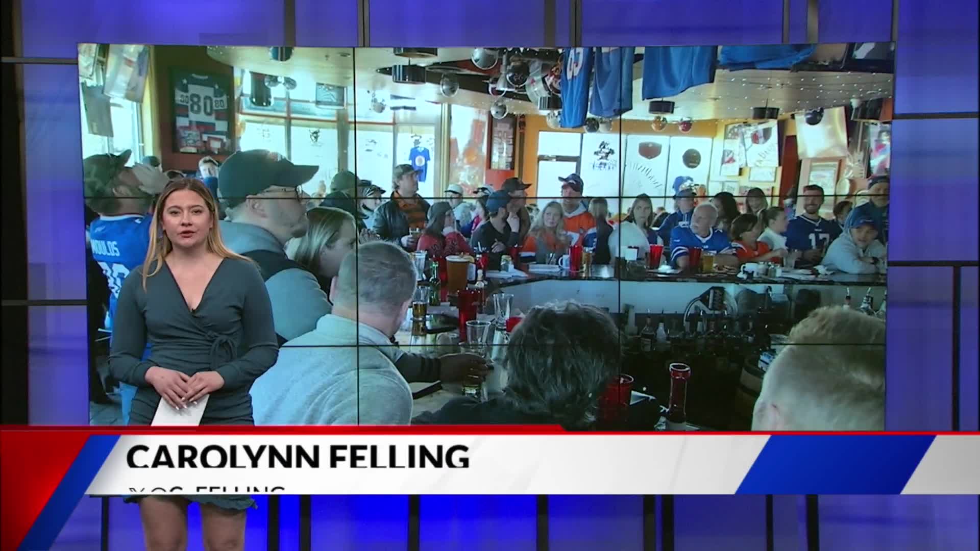 Broncos and Bills fans side by side at local bar for playoff game ...