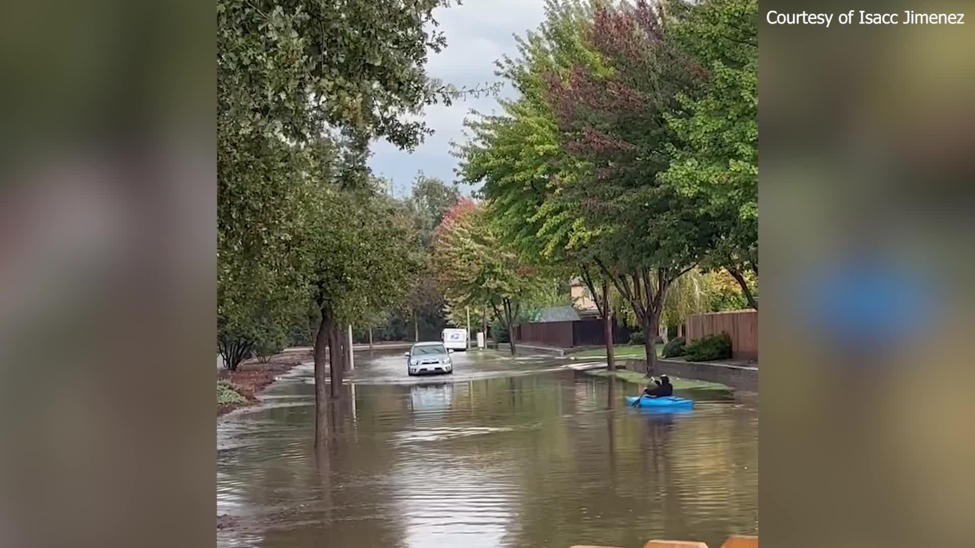Resident spotted kayaking through Visalia neighborhood after storm ...